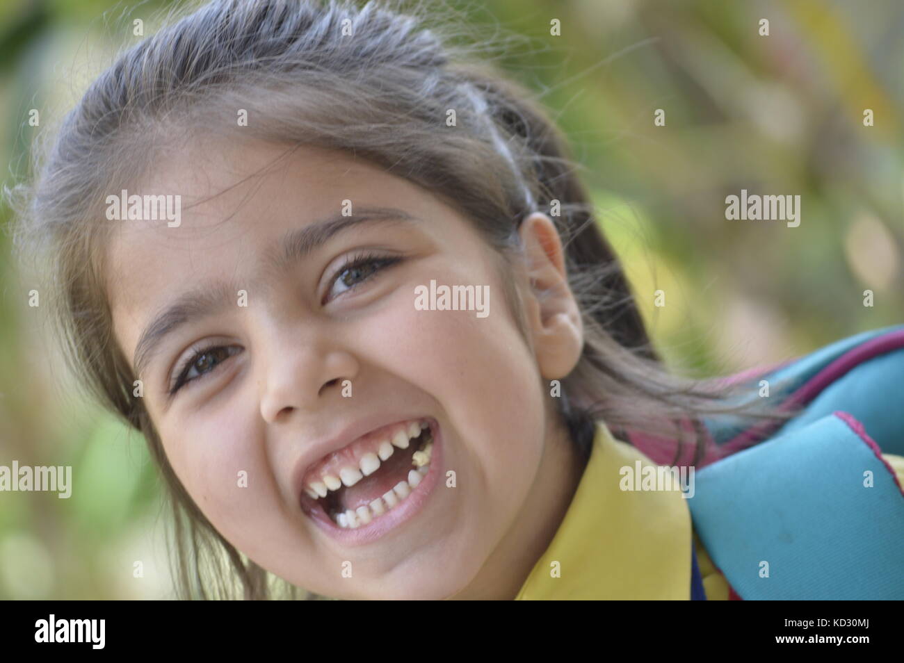 An innocent smile Stock Photo - Alamy