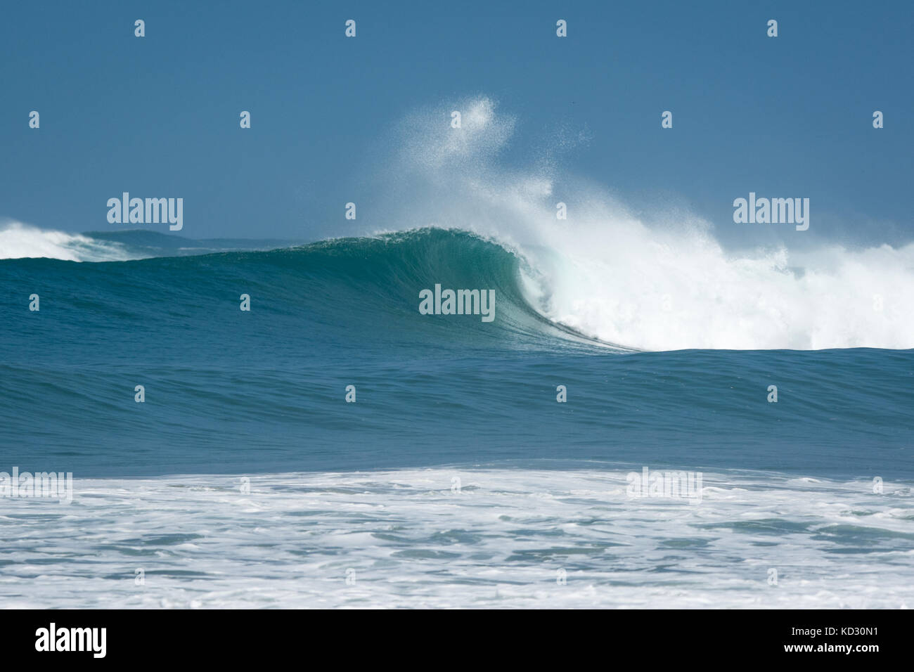 Ocean wave and spray against blue sky, Santa Cruz, Guanacaste, Costa ...