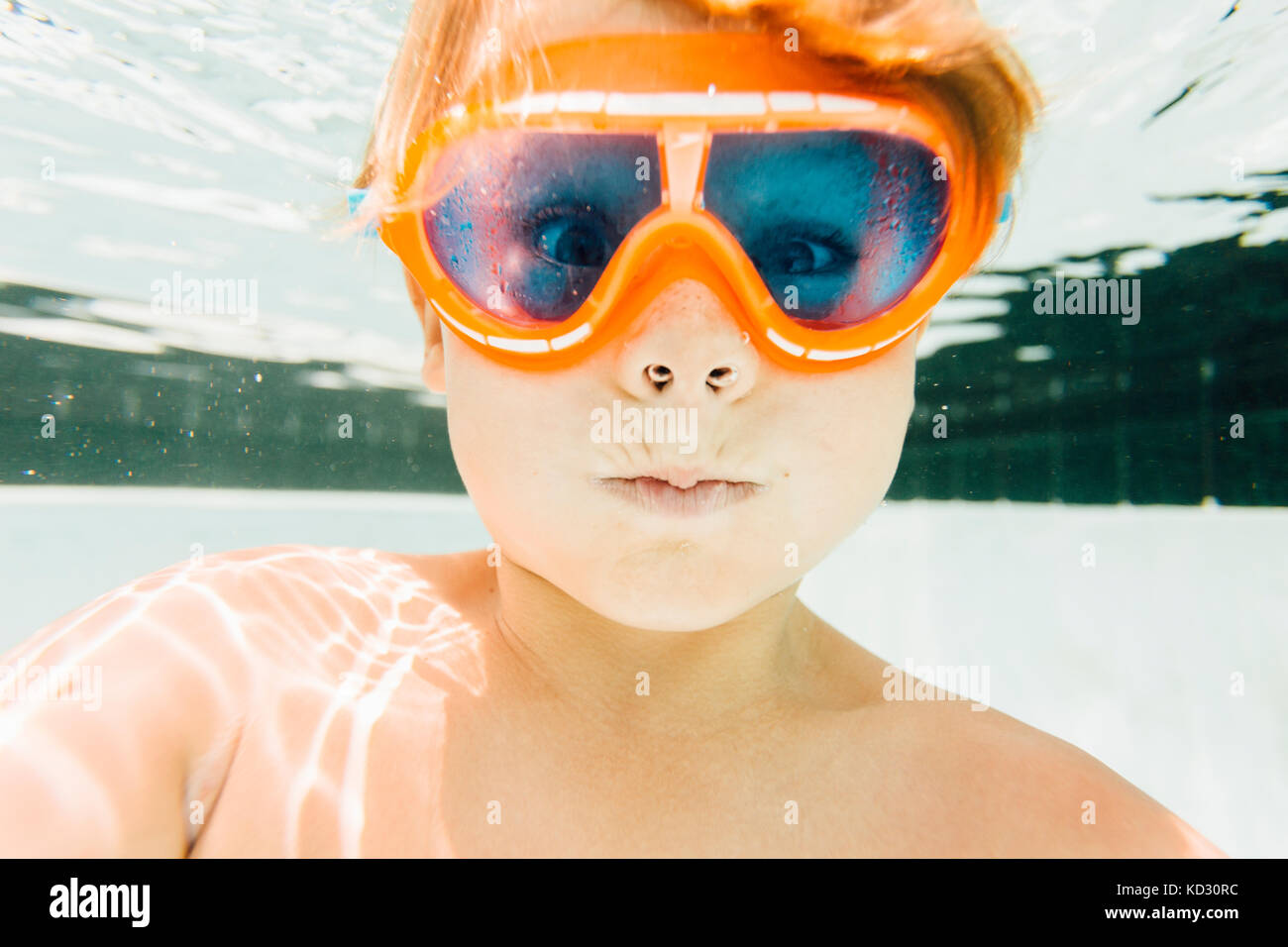 Boy holding breath underwater hi-res stock photography and images - Alamy