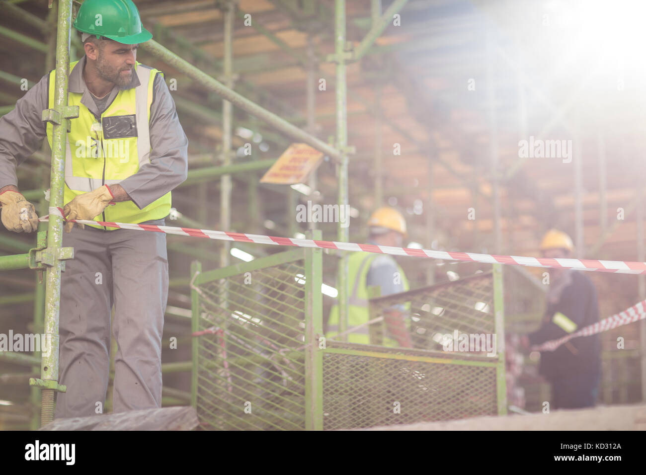 Construction worker on building site Stock Photo - Alamy