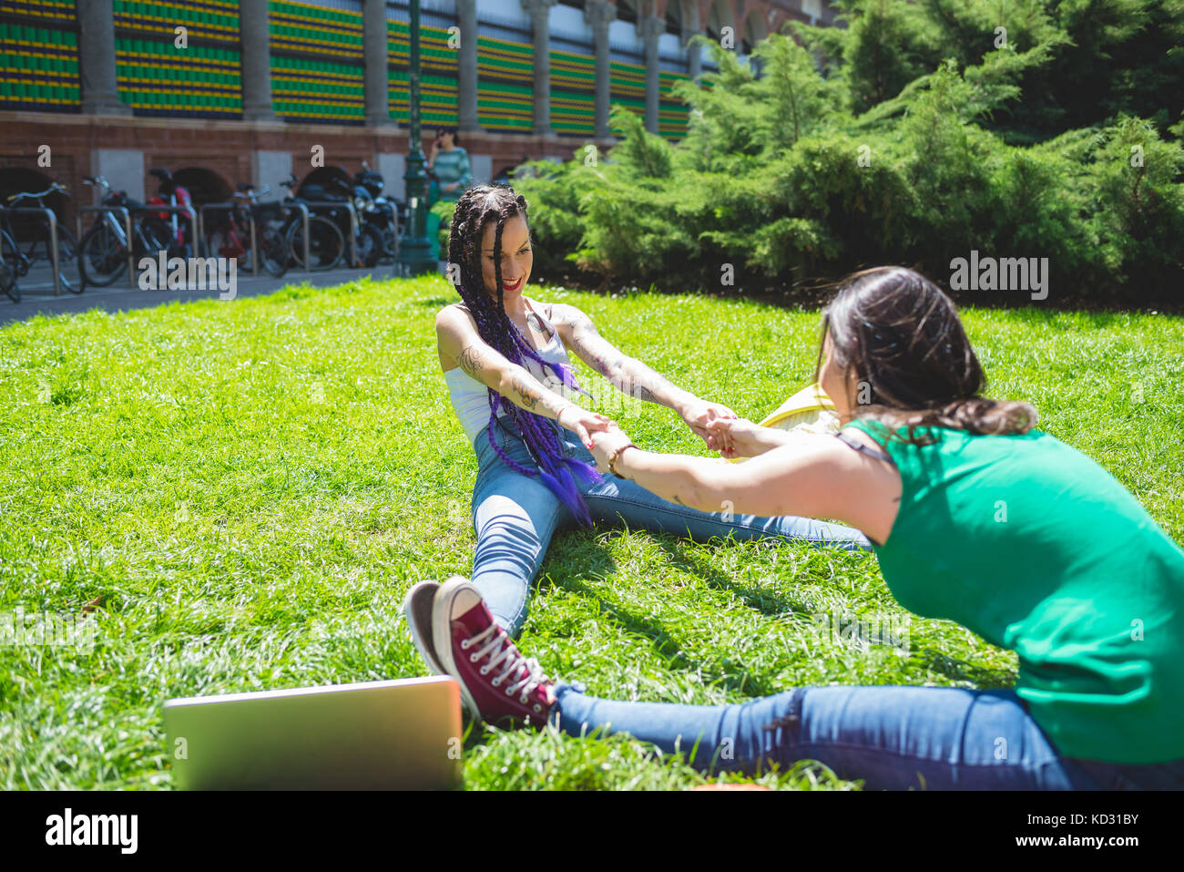 Women doing stretching exercise, Milan, Italy Stock Photo - Alamy
