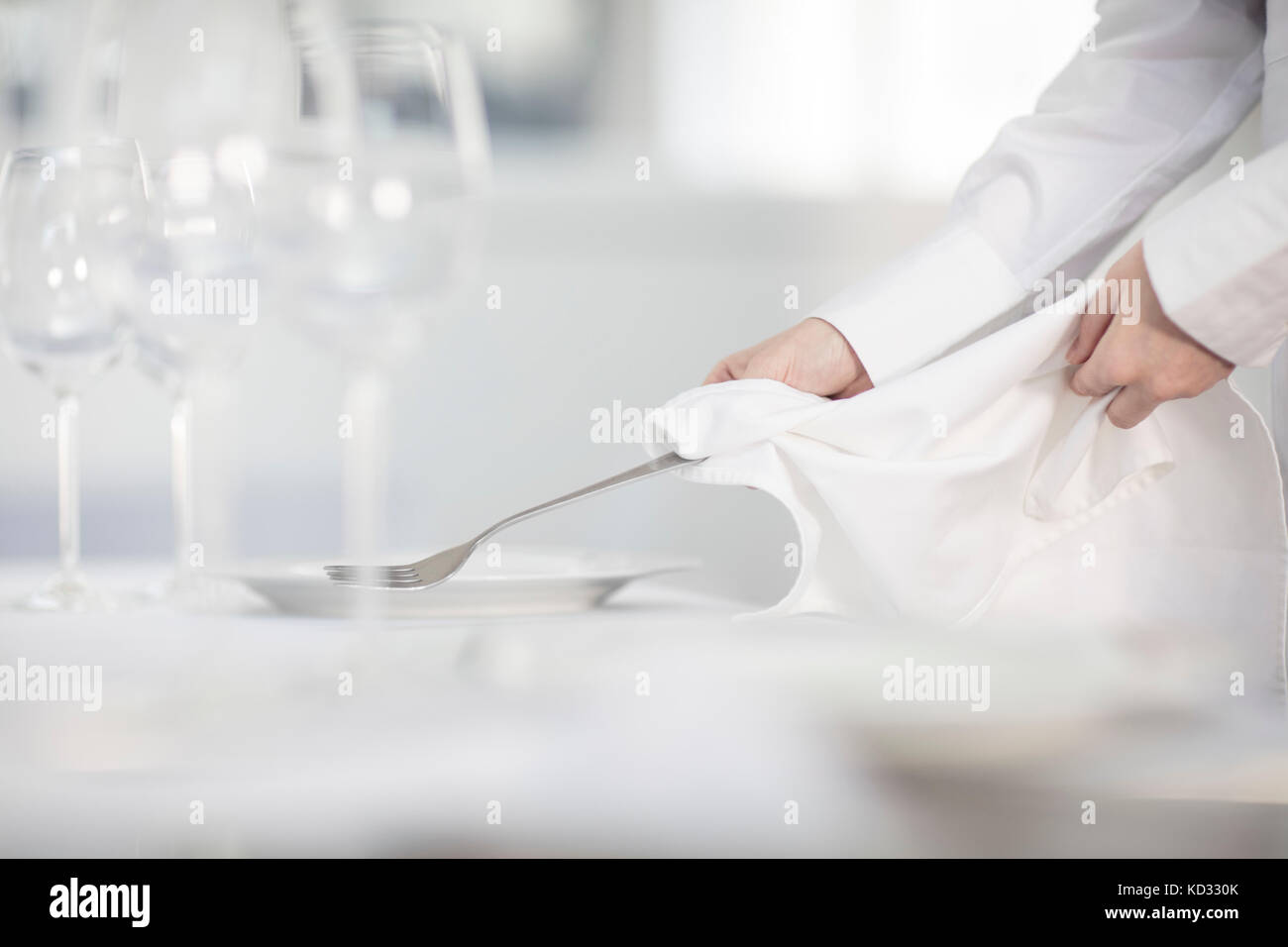 Waitress laying the table hi-res stock photography and images - Alamy