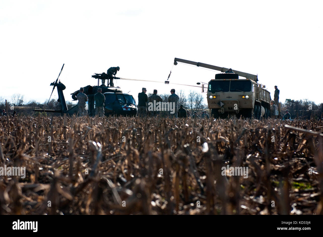 U.S. Soldiers from the S.C. Army National Guard work to prepare a UH-60 ...