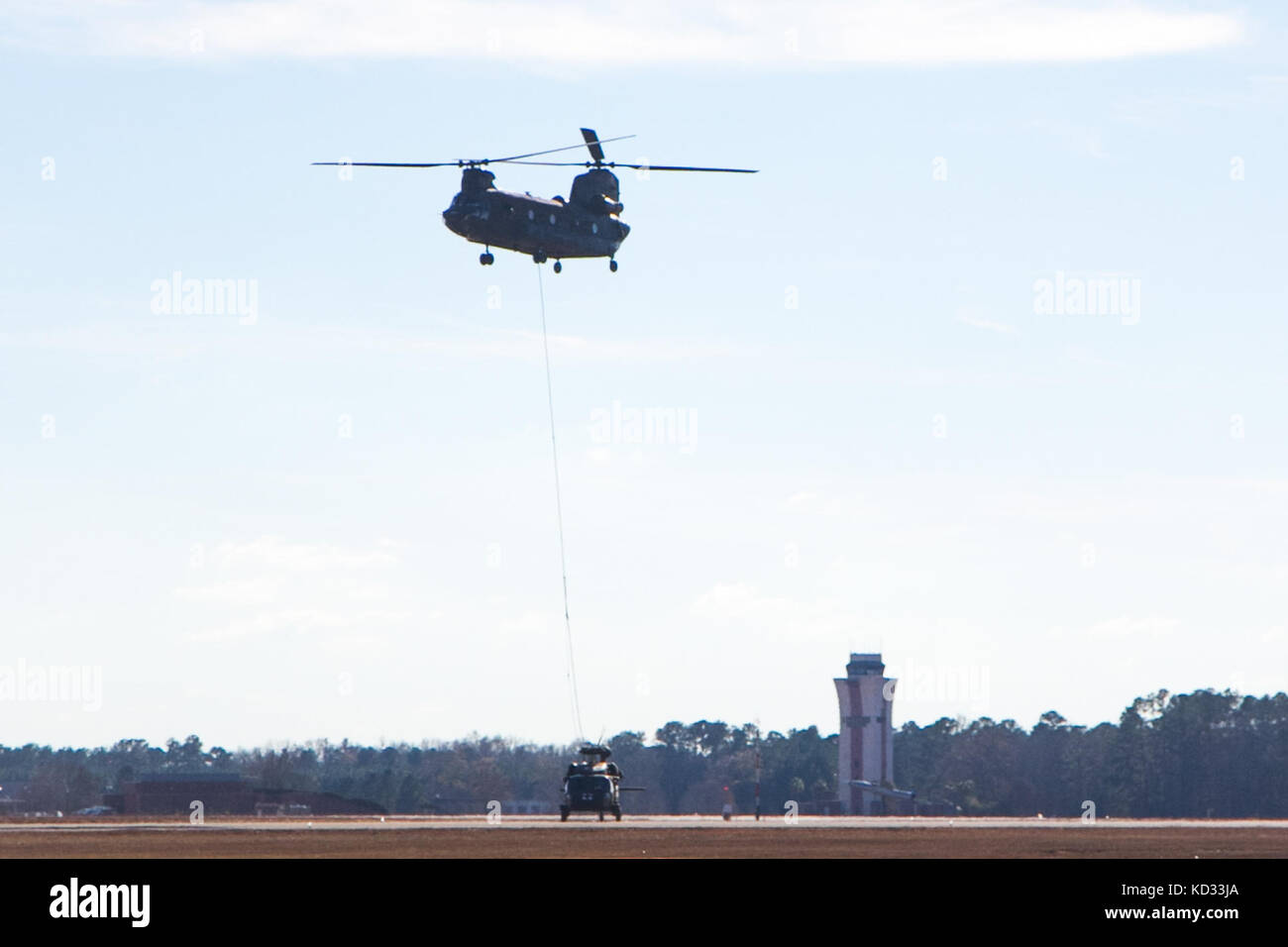 U.S. Soldiers from the S.C. Army National Guard sling-load a UH-60 ...