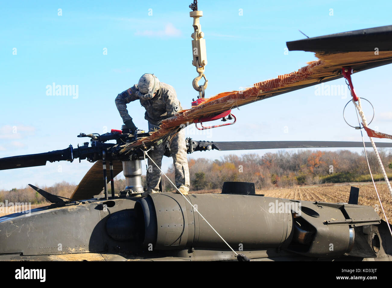 U.S. Soldiers from the S.C. Army National Guard work to prepare a UH-60 ...