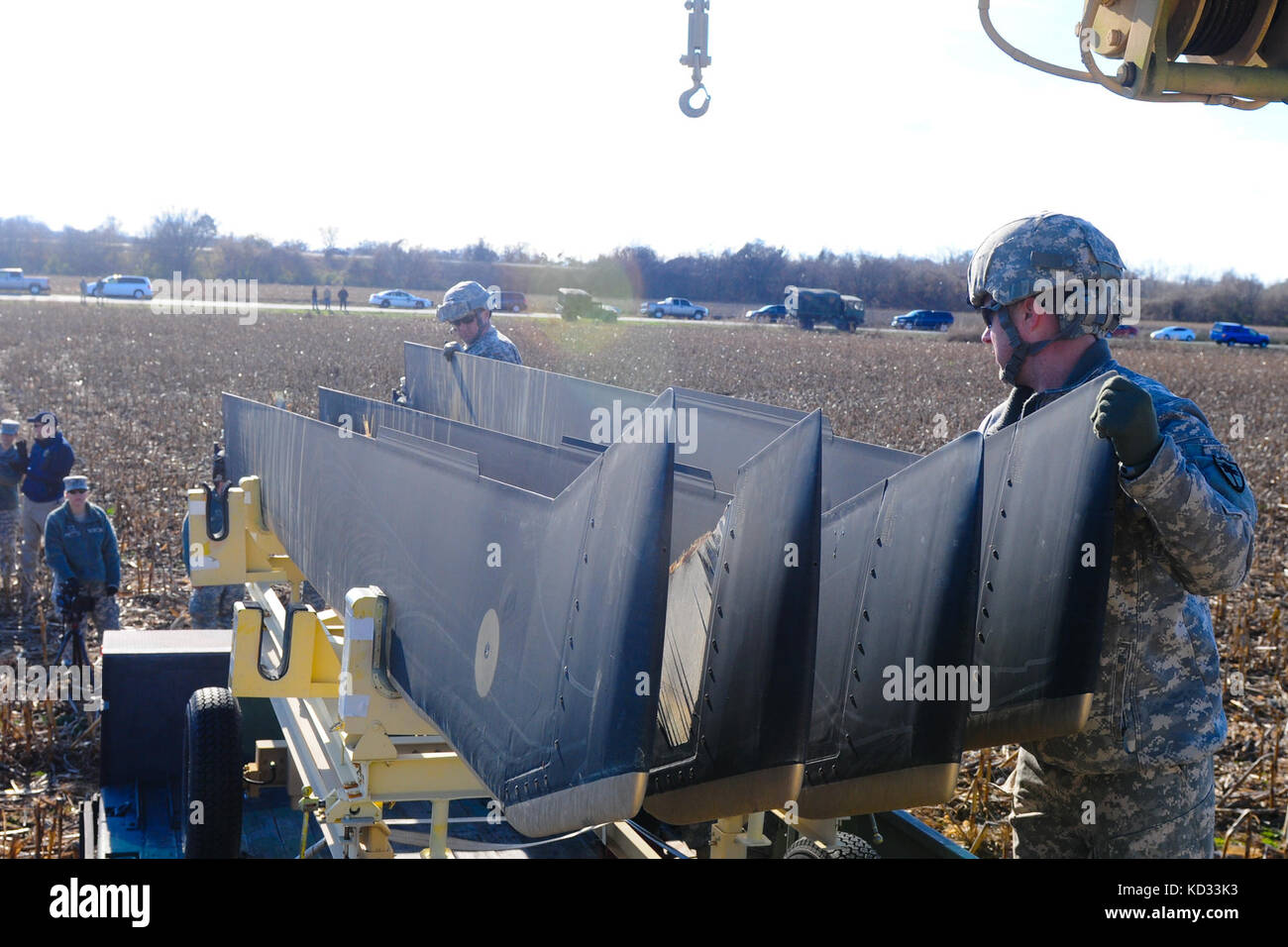 U.S. Soldiers from the S.C. Army National Guard work to prepare a UH-60 ...