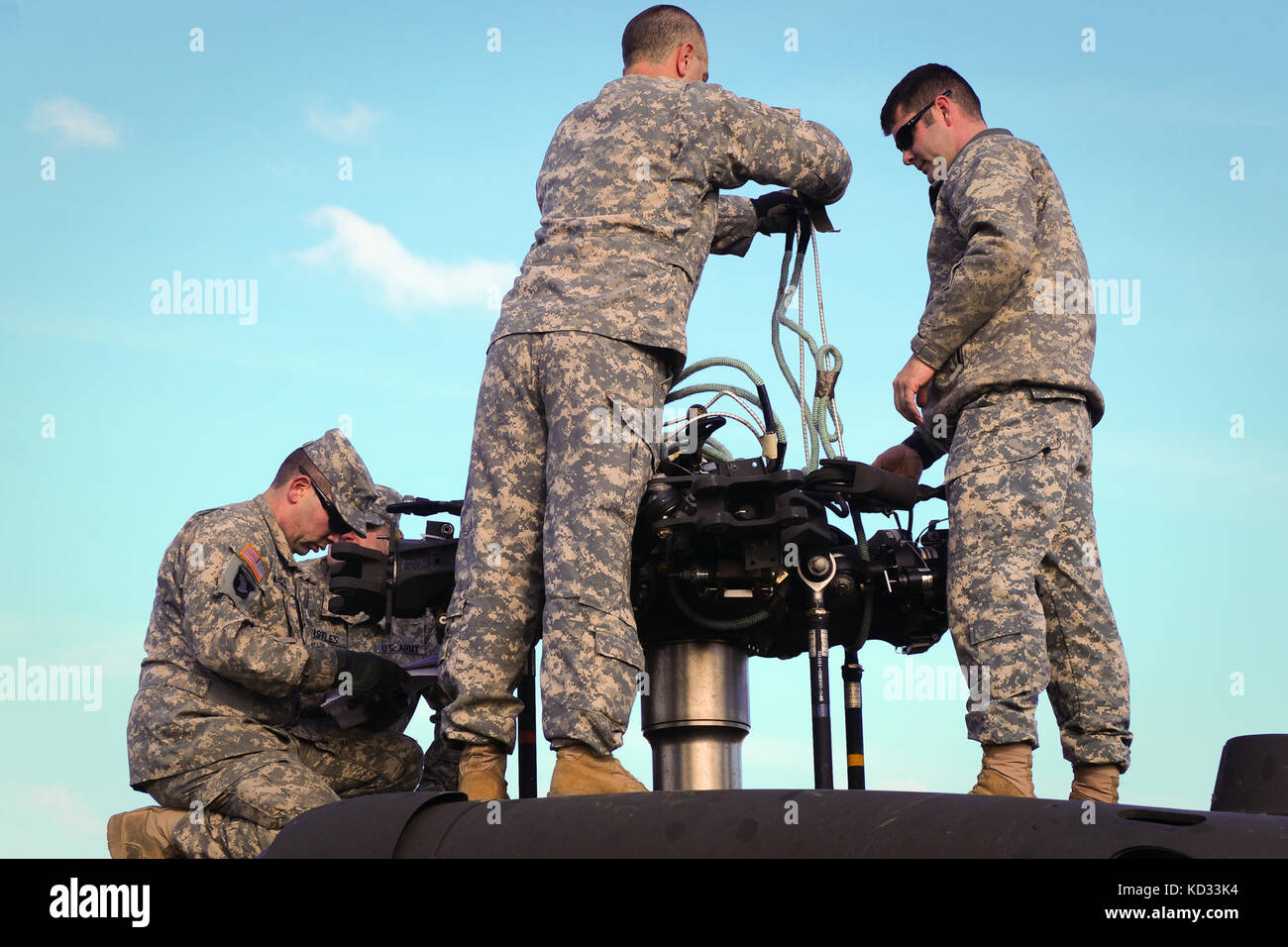 U.S. Soldiers from the S.C. Army National Guard work to prepare a UH-60 ...