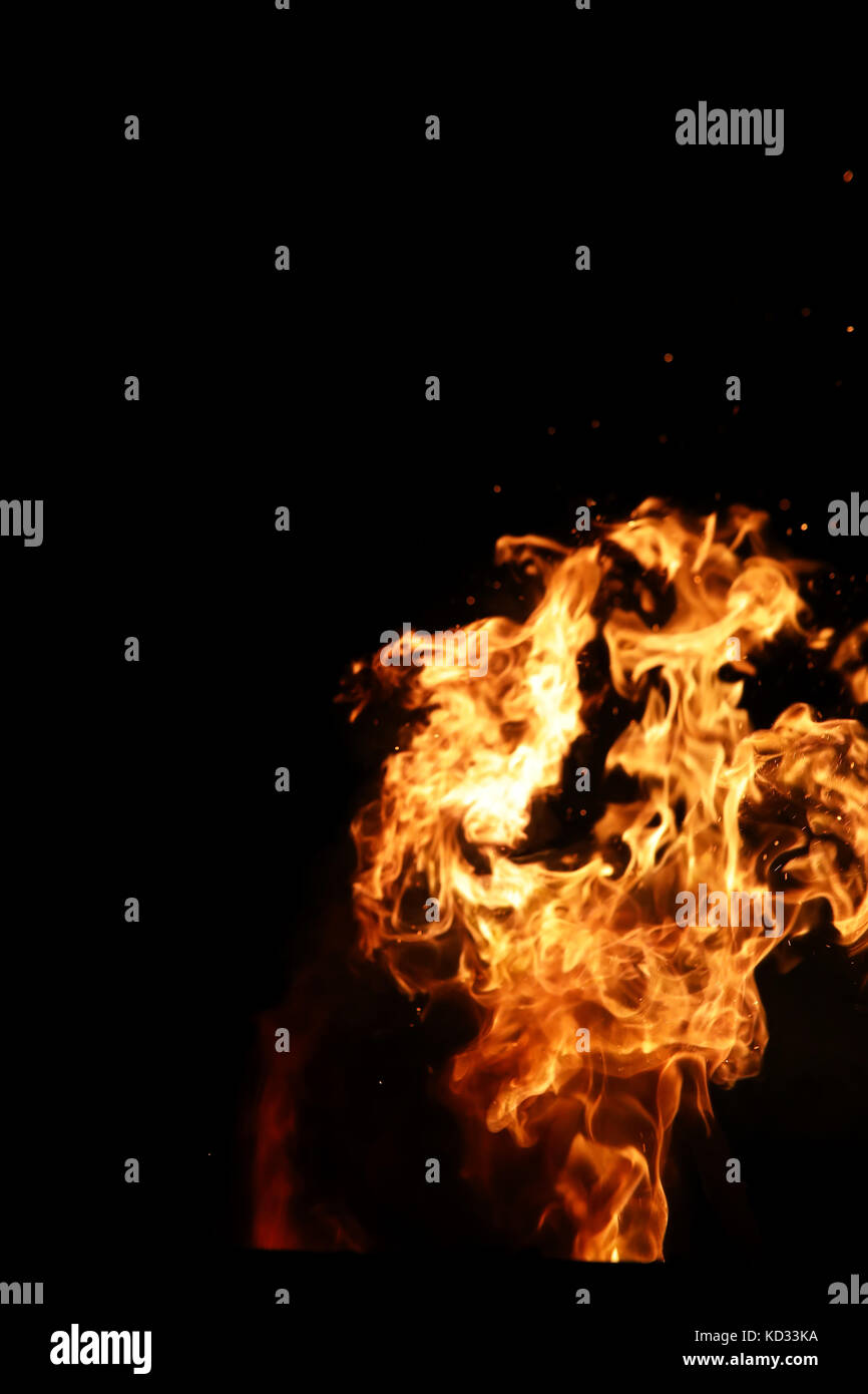 Tongues of flame of fire of orange-yellow color from burning fir Stock ...