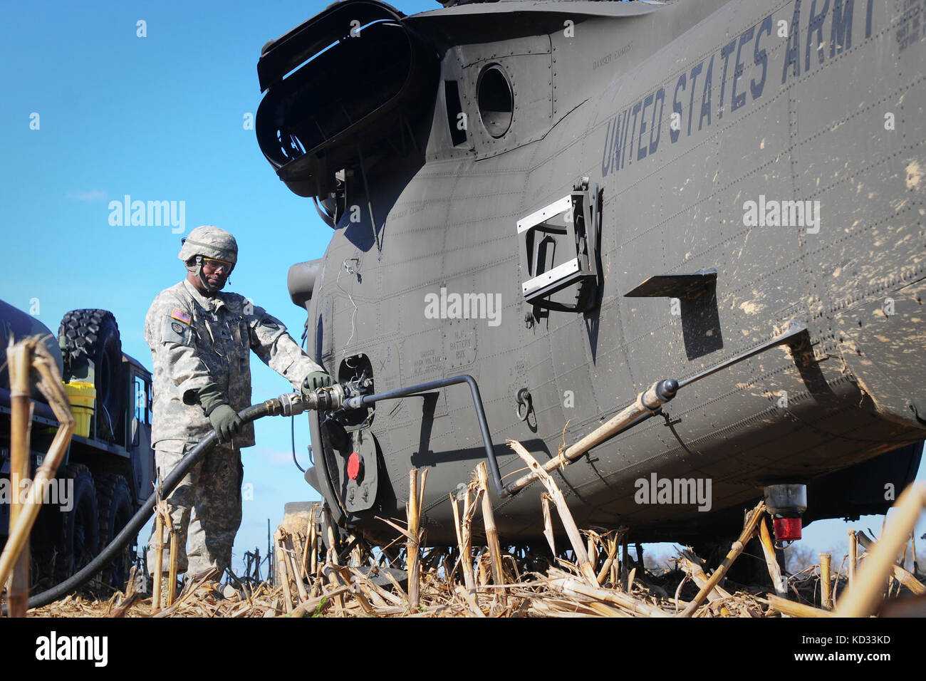 U.S. Soldiers from the S.C. Army National Guard work to prepare a UH-60 ...