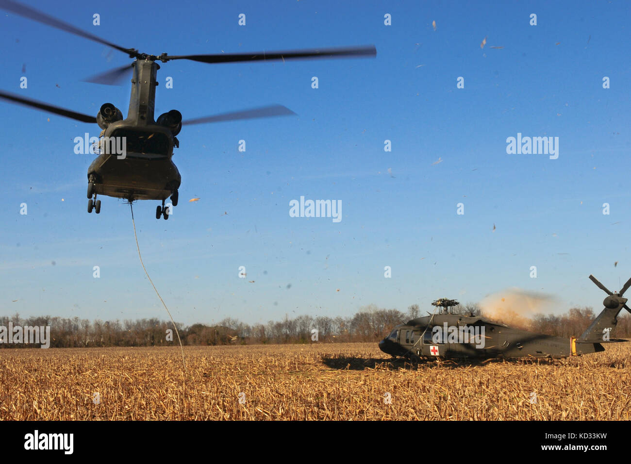 U.S. Soldiers from the S.C. Army National Guard work to prepare a UH-60 ...