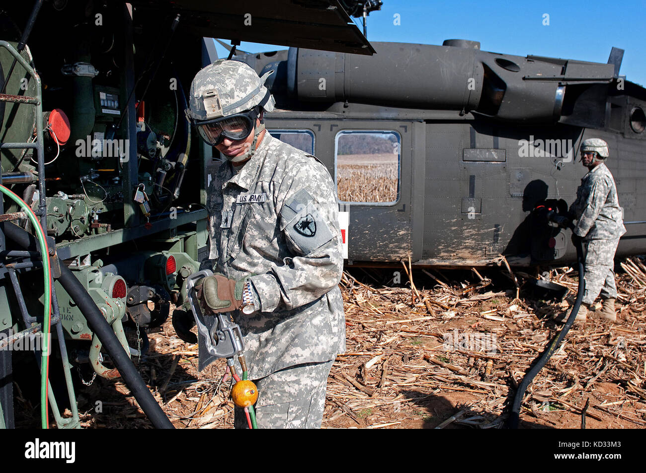 U.S. Soldiers from the S.C. Army National Guard work to prepare a UH-60 ...