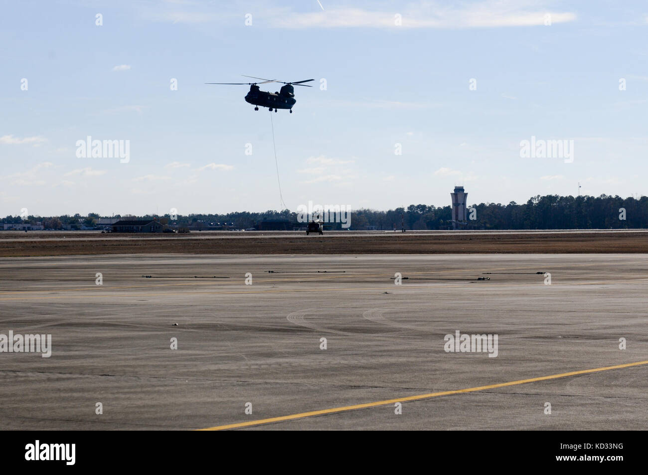 U.S. Soldiers from the S.C. Army National Guard sling-load a UH-60 ...