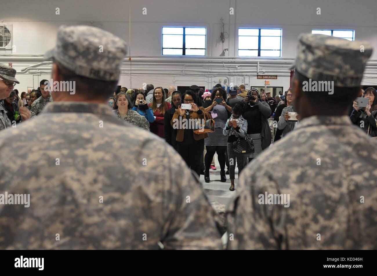 Family and friends observe the formation of U.S. Soldiers assigned to ...
