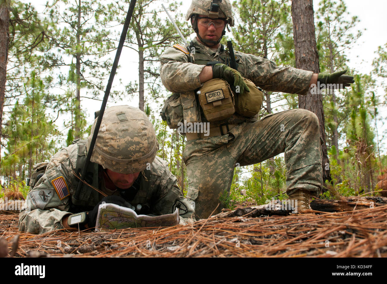 U.S. Army Sgt. Travis Maroney and Staff Sgt. Andrew Brazell, assigned ...