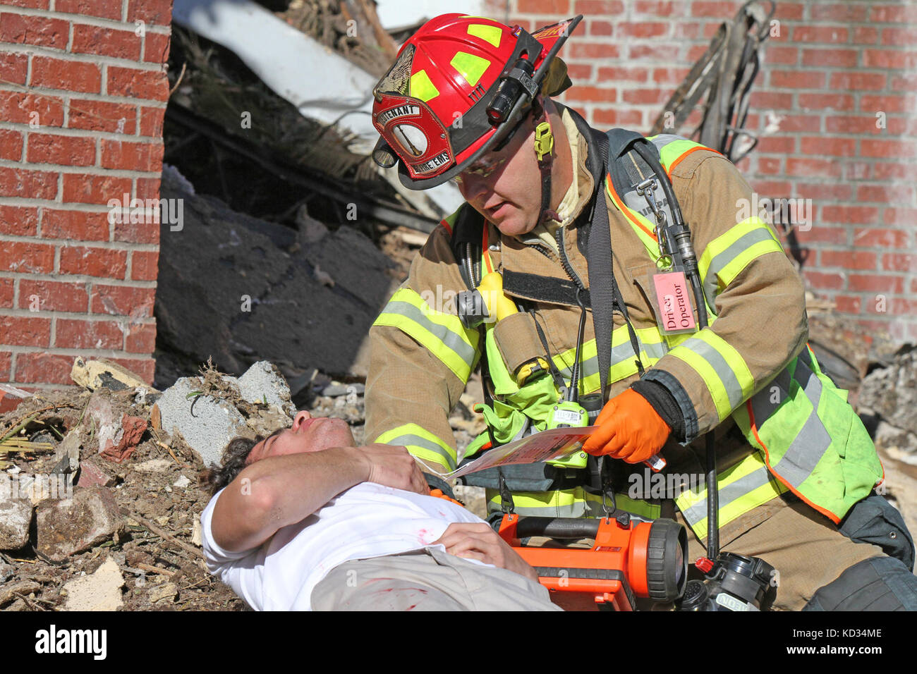 Lt. Eric Heneon, Georgetown County Fire Department, reads the injury ...