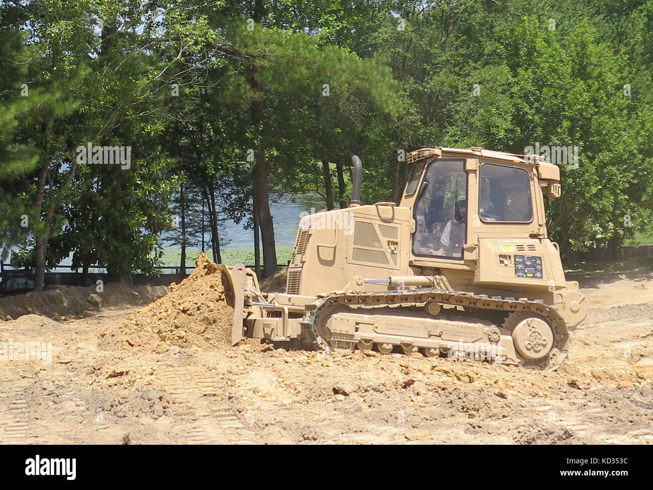 U.S. Soldier Staff Sgt. Edward Segal, a horizontal construction ...