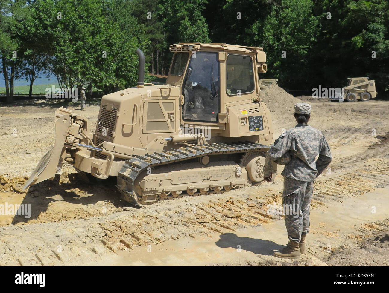 U.S. Soldier Pfc. Kristen Grier, a horizontal construction engineer ...