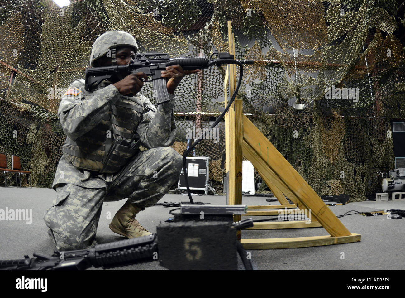 U.S. Army Specialist Garfield Ferdinand, from the 657th Maintenance ...