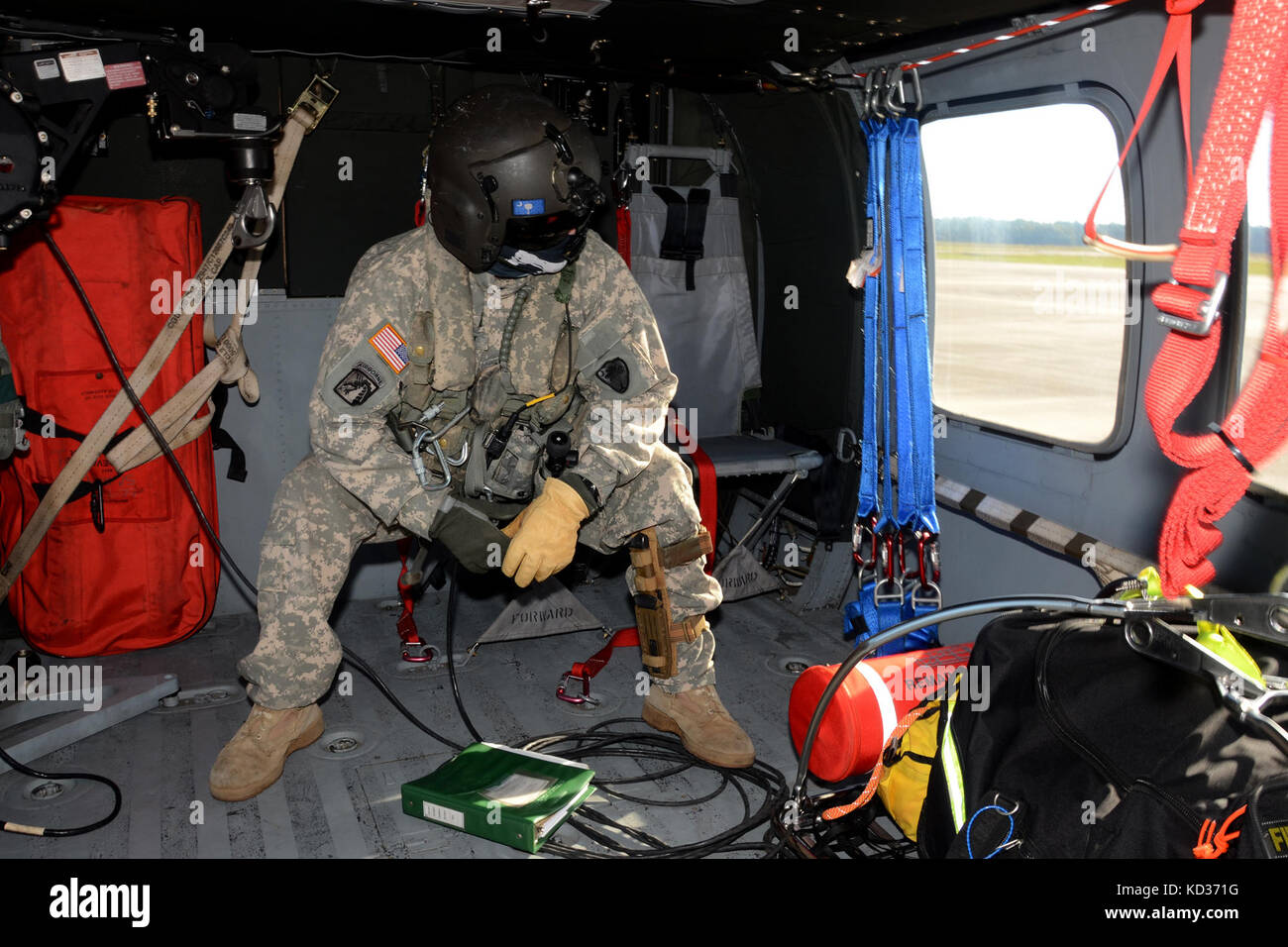 U.S. Army Staff Sgt. James Parrott, a UH-60 Black Hawk helicopter crew ...
