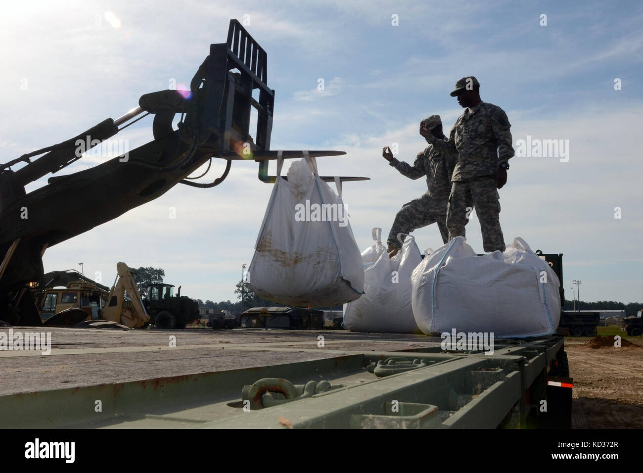 U.S. Army Sgt. Corey Gary (right) and Spc. Josh Bell (left), truck ...