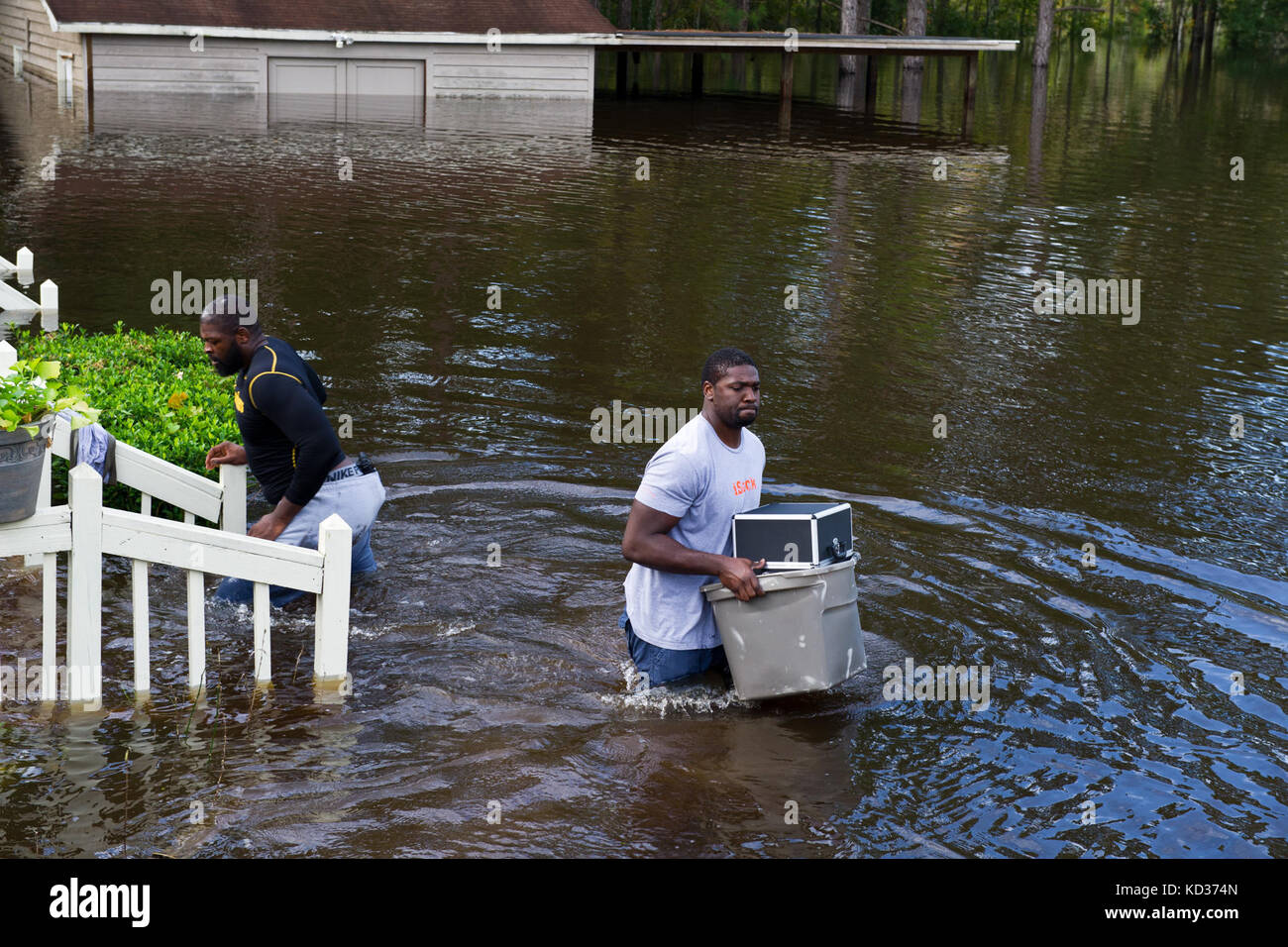 Former NFL player Robert Geathers retrieves any possessions not ...