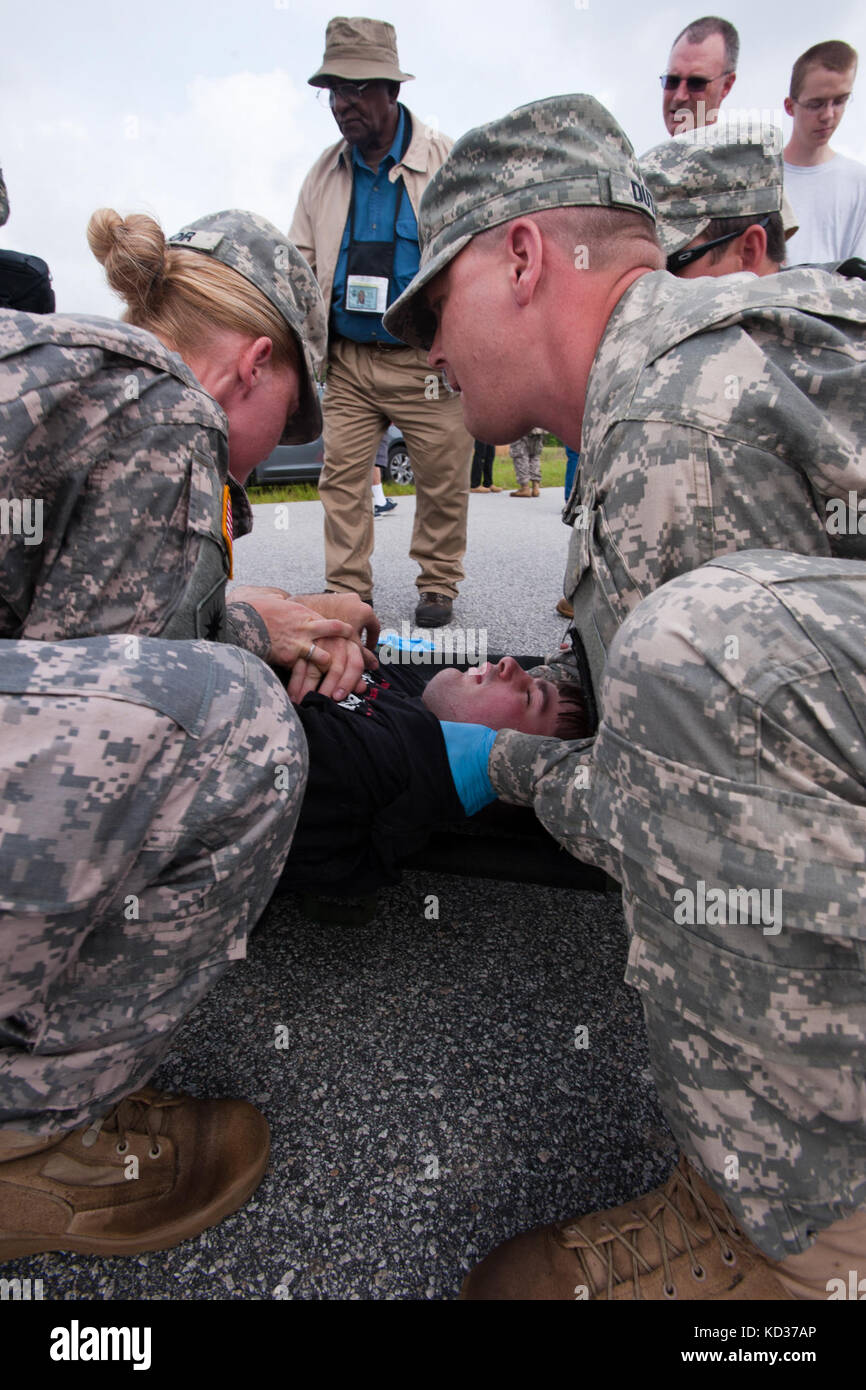 U.S. Army Soldiers, S.C. Army National Guard, load a simulated casualty ...