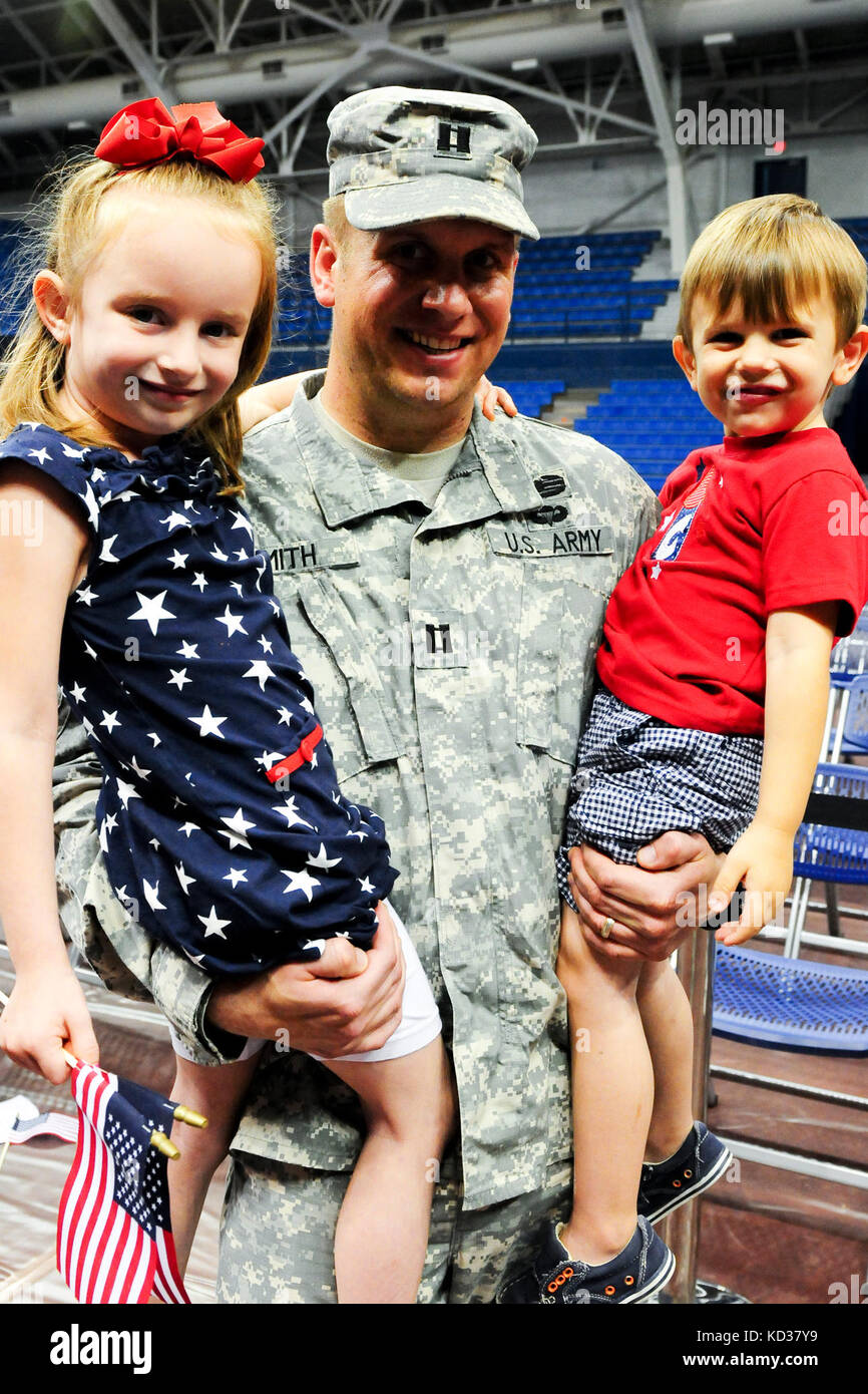 Capt. Adam Smith reunites with his children Kate and Charlie at the ...