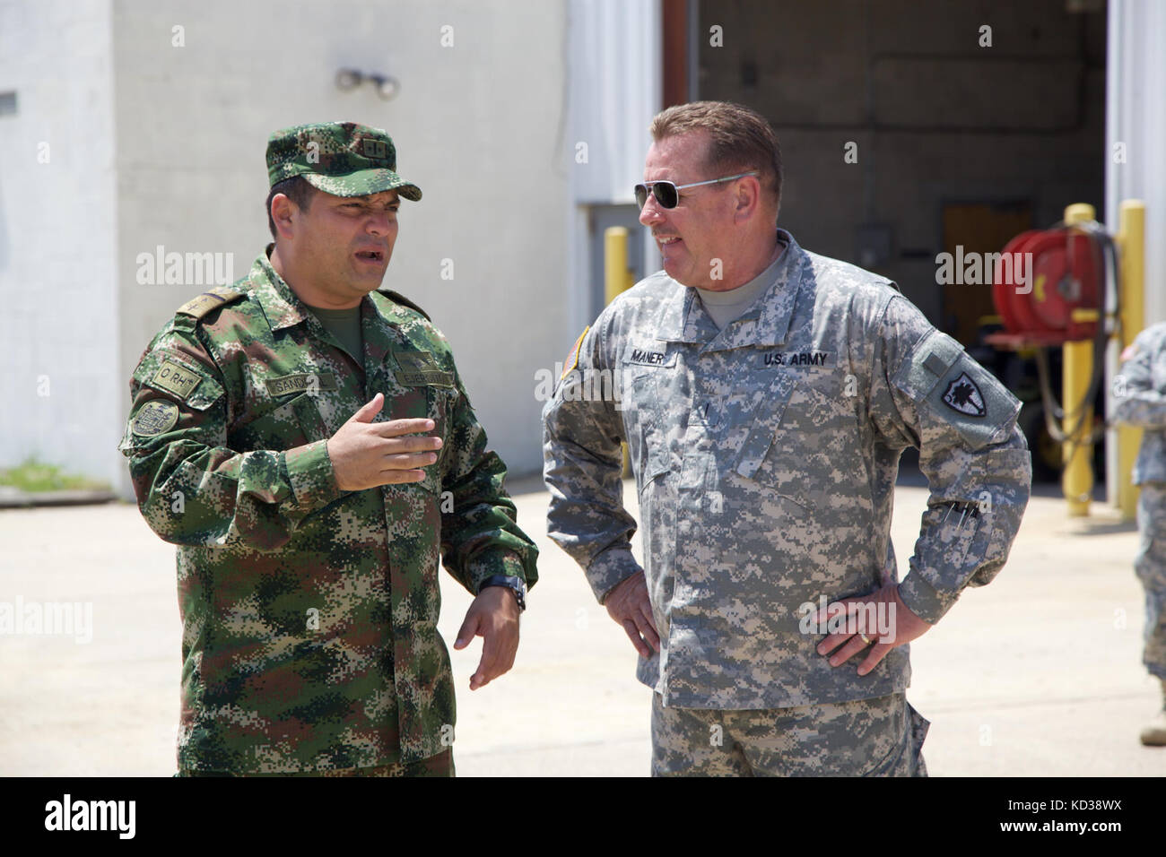 U.S. Army Chief Warrant Officer 5 Lawrence Maner talks with Colombian ...