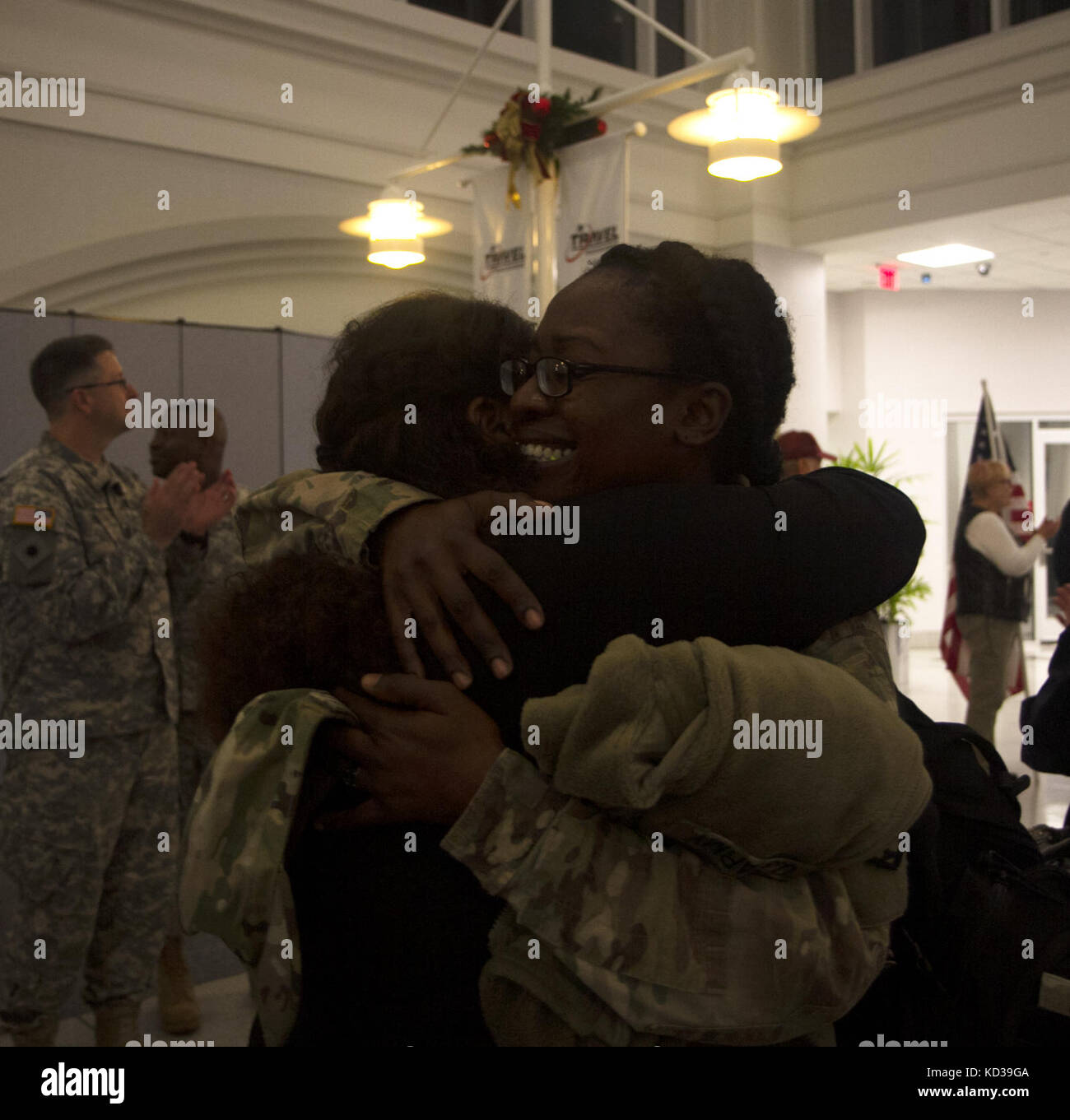 U.S. Army Staff Sgt. Yaronda Mathis is welcomed back from a deployment ...