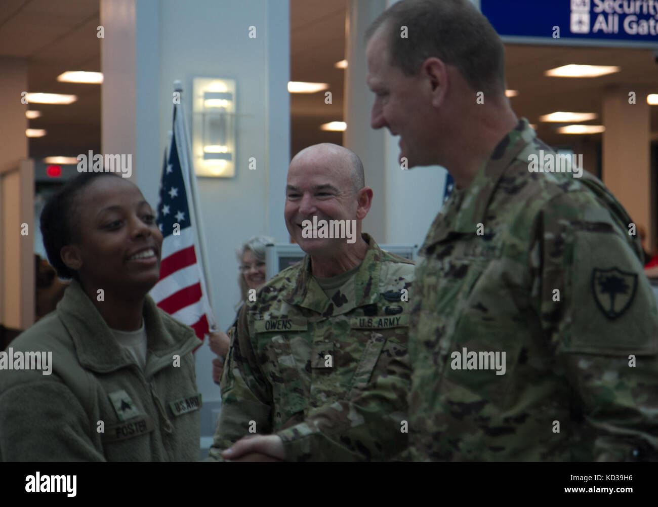 U.S. Army Sgt. Behanca Foster is welcomed by U.S. Army Brig. Gen. Brad ...