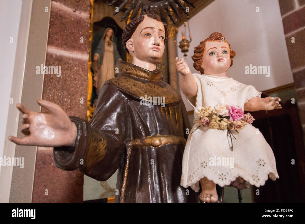 Close up view of two Religious figures on a church Stock Photo - Alamy