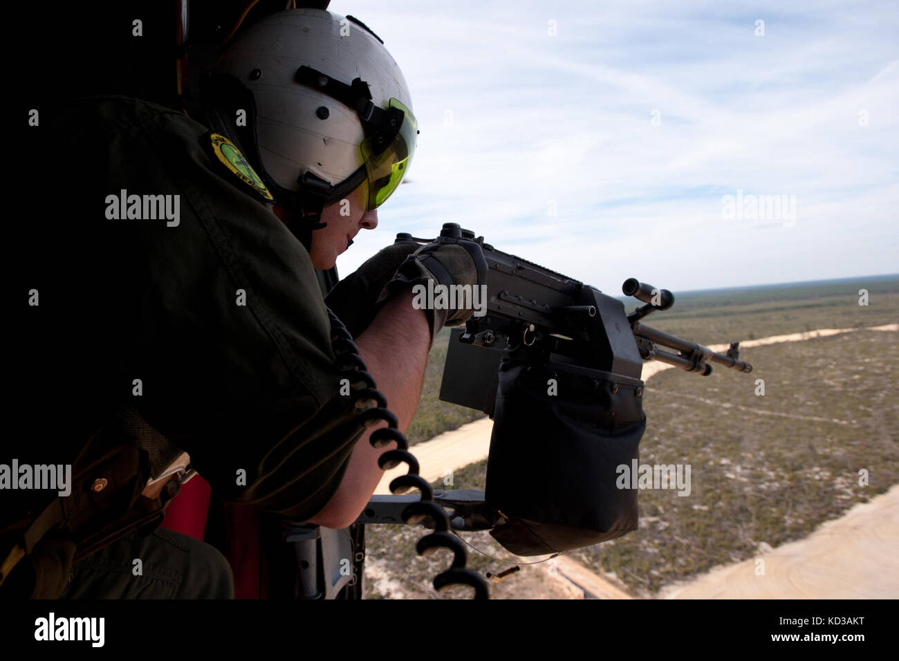 U.S. Navy Naval Air Crewman Mike Jones assigned to Helicopter Anti ...