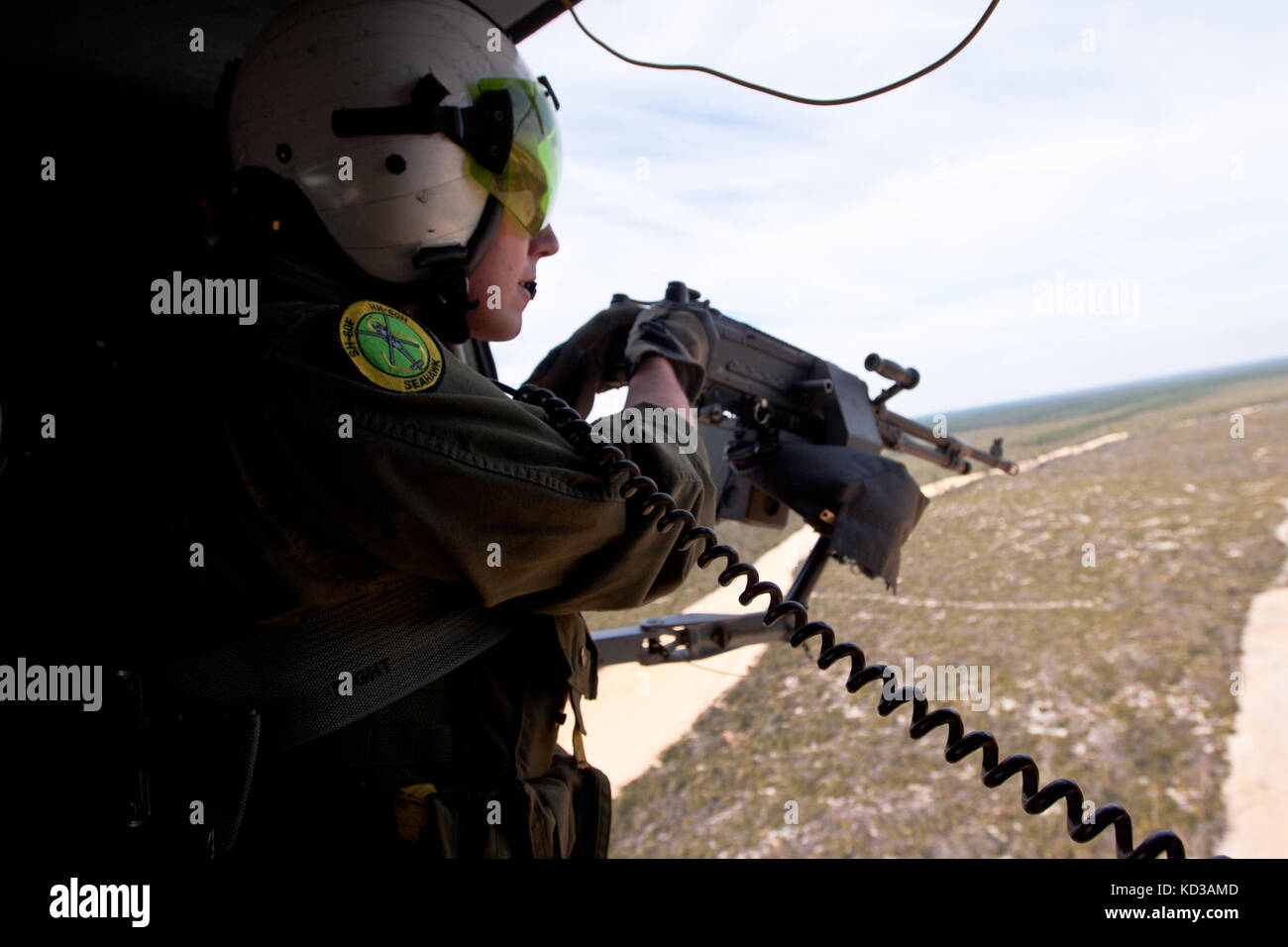 U.S. Navy Naval Air Crewman Mike Jones assigned to Helicopter Anti ...