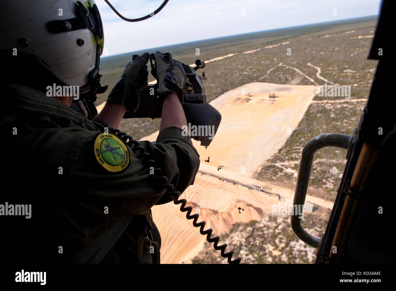 U.S. Navy Naval Air Crewman Mike Jones assigned to Helicopter Anti ...