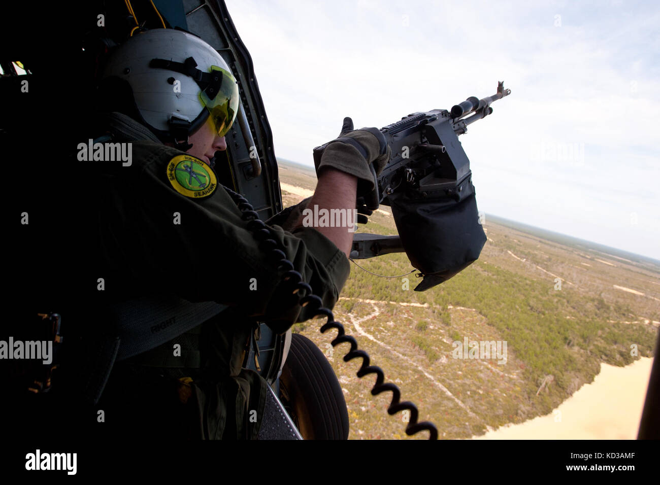 U.S. Navy Naval Air Crewman Mike Jones assigned to Helicopter Anti ...