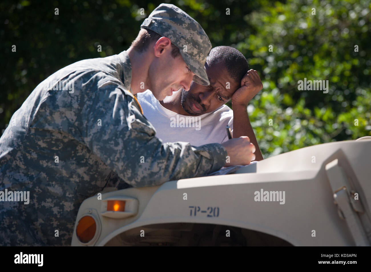 U.S. Army Sgt. Brandon Stafford assigned to the 133rd Military Police ...