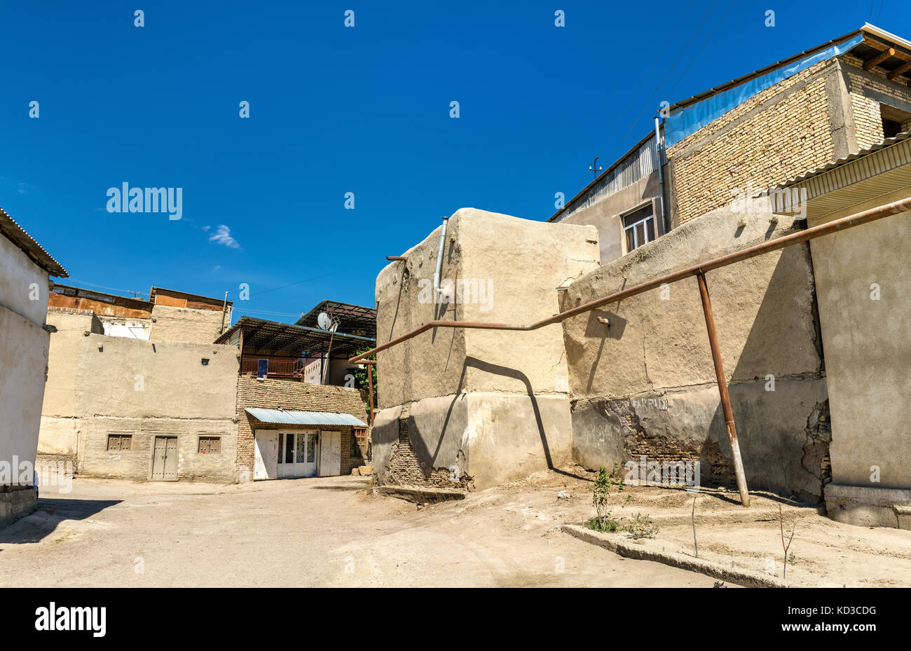 Traditional houses in the old town of Bukhara, Uzbekistan Stock Photo ...