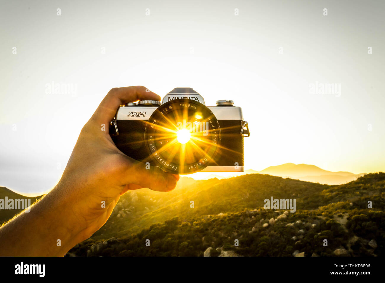 film camera with sun rays in the mountains Stock Photo - Alamy