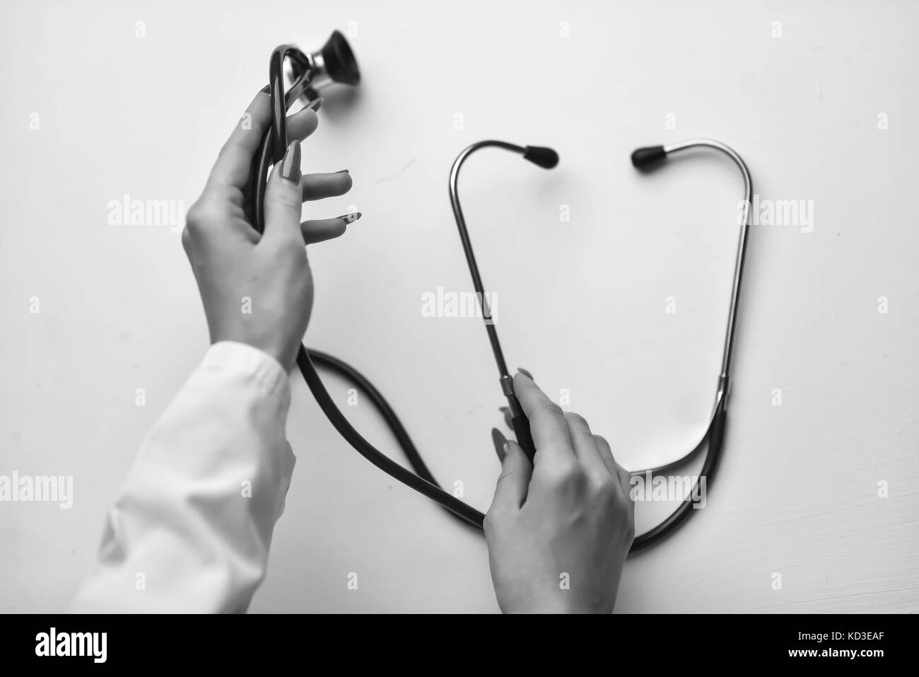 A stethoscope in the hands Stock Photo - Alamy