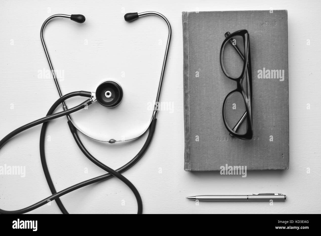 Stethoscope and book on Desk Stock Photo - Alamy