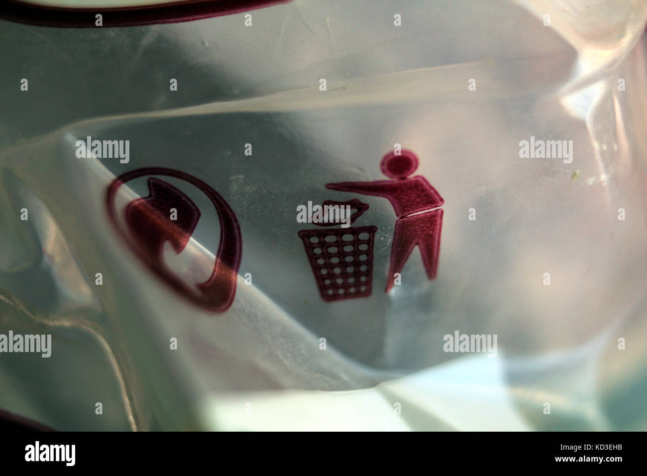 Close-up of garbage drop icon in a plastic bag Stock Photo - Alamy