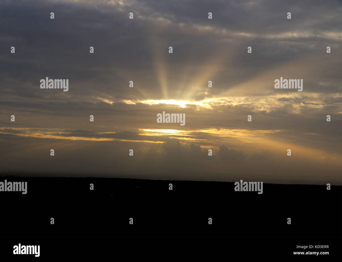 Sun rays from cloud Stock Photo - Alamy