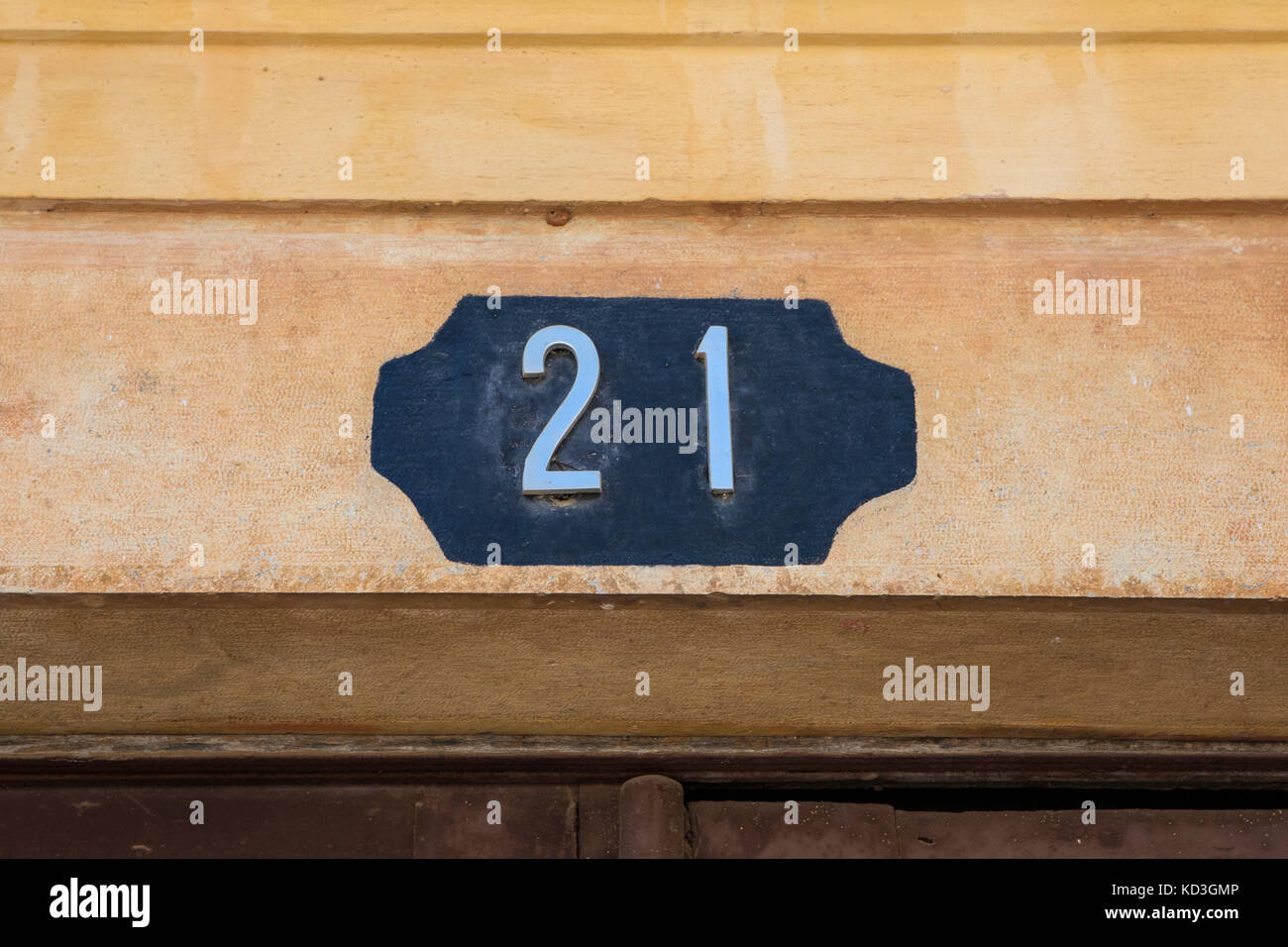 The Number 21 on a wall Stock Photo - Alamy