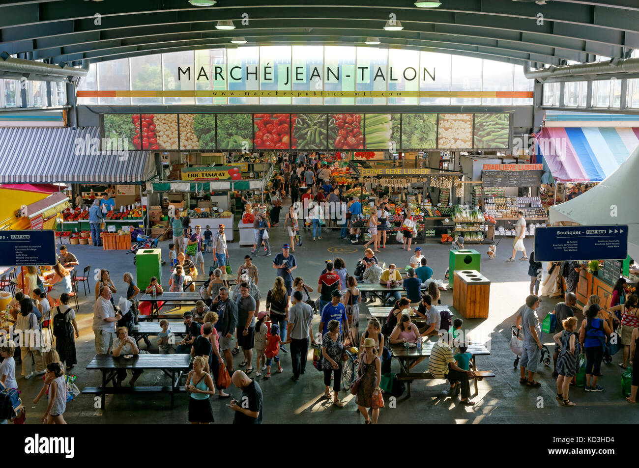 People inside the Jean Talon public market or Marche Jean Talon ...