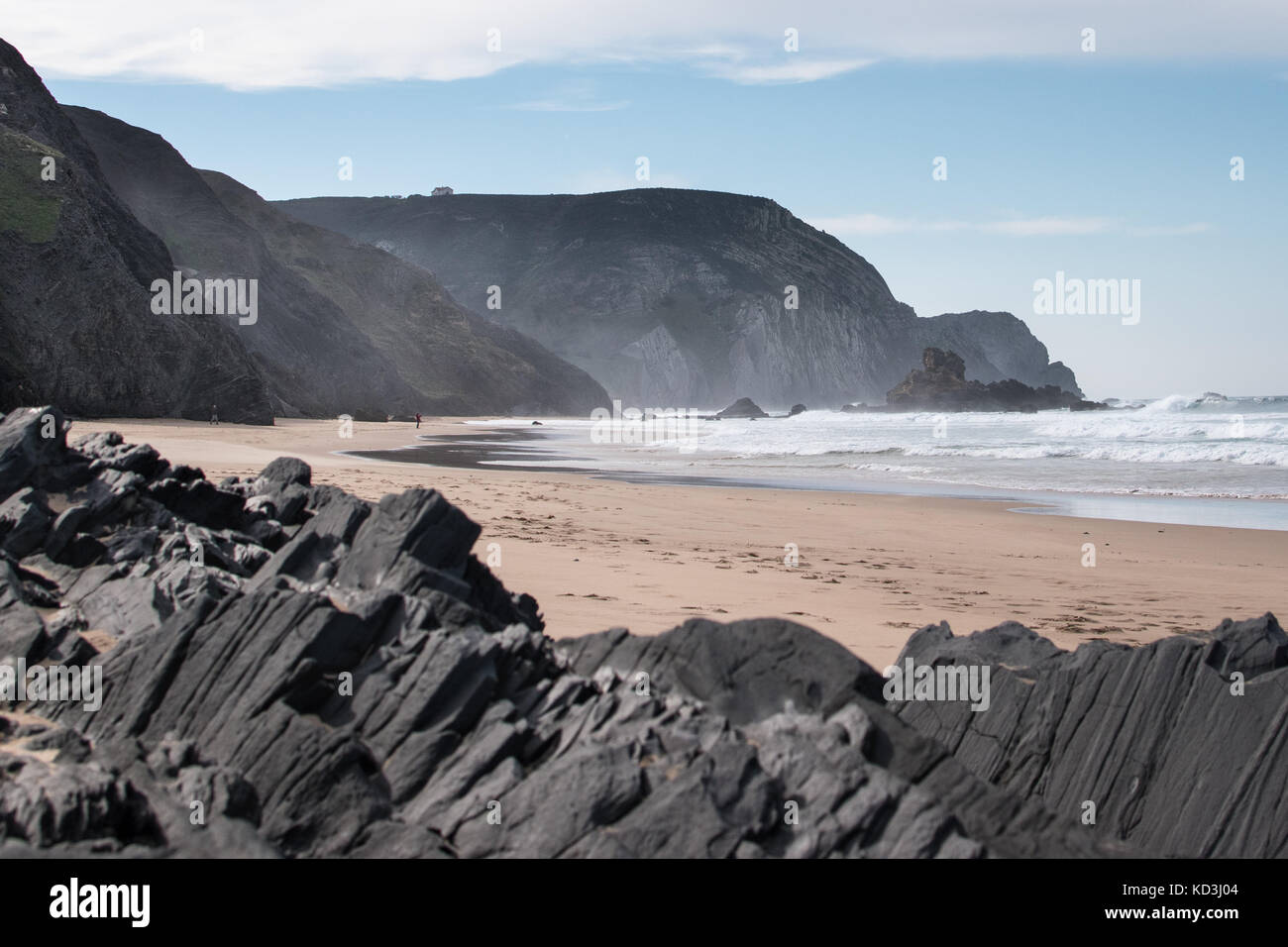 Sandy beach and rocky cliffs Stock Photo - Alamy