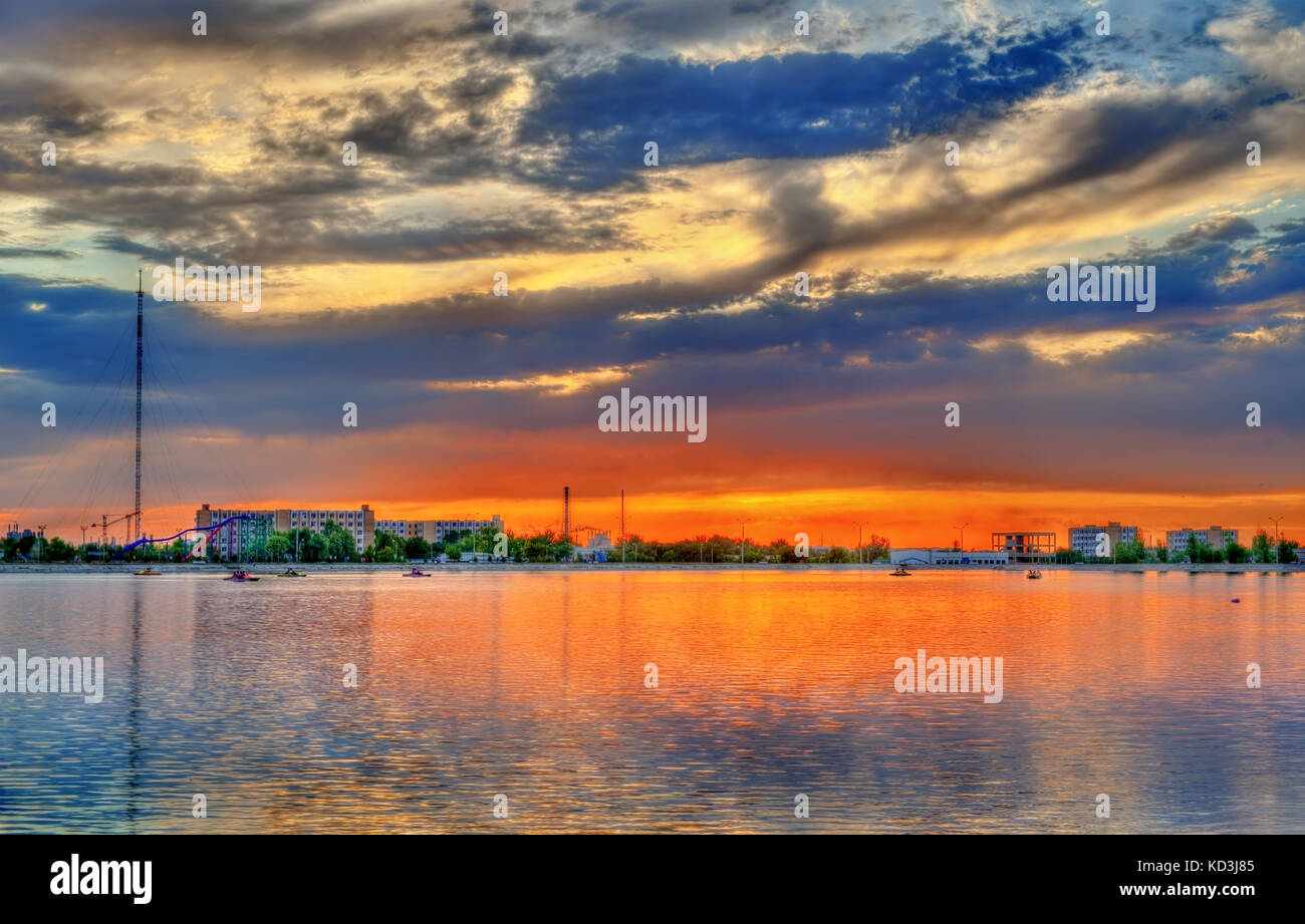 Sunset over the city lake in Navoi, Uzbekistan Stock Photo - Alamy