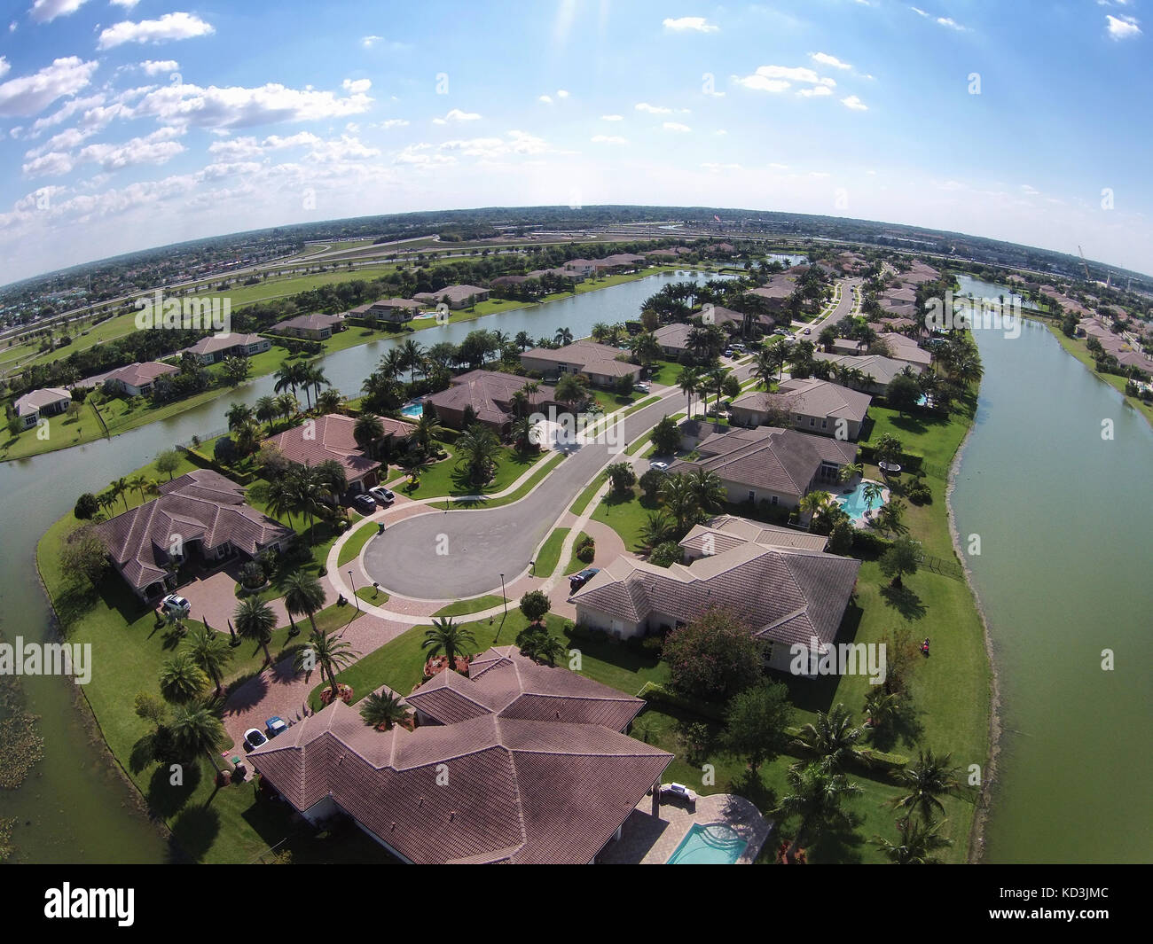 Waterfront homes in Florida seen from above flyover view Stock Photo ...