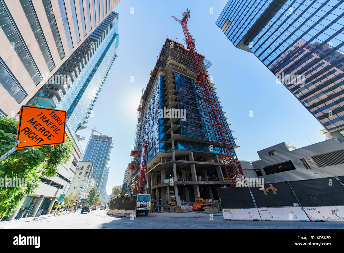 Tall building under construction at downtown Stock Photo - Alamy