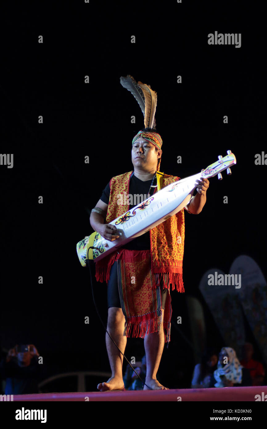 Playing traditional musical instrument from Sarawak, Malaysia Stock ...