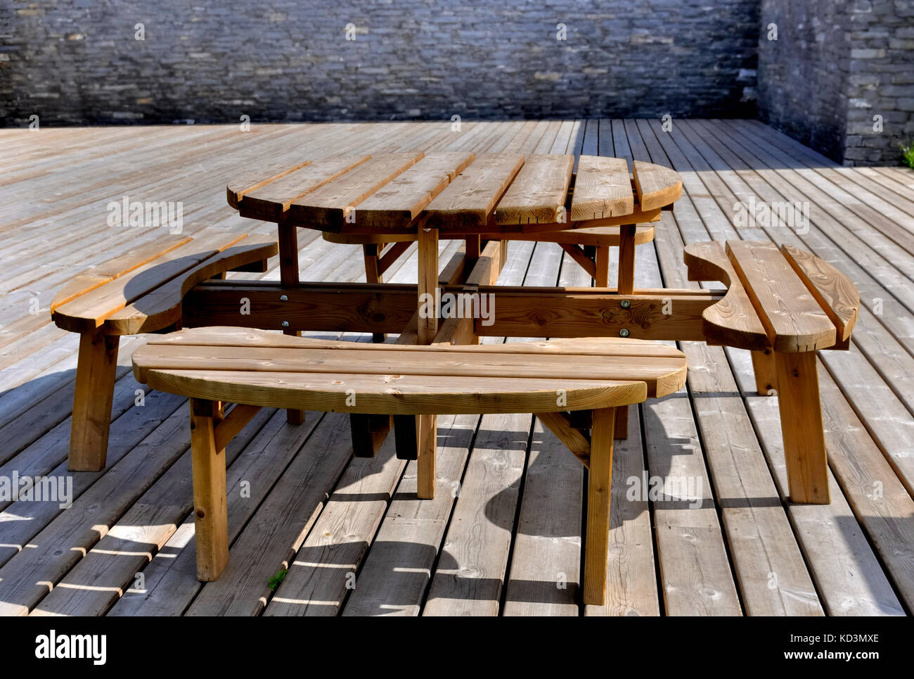 table on wooden terrace Stock Photo - Alamy
